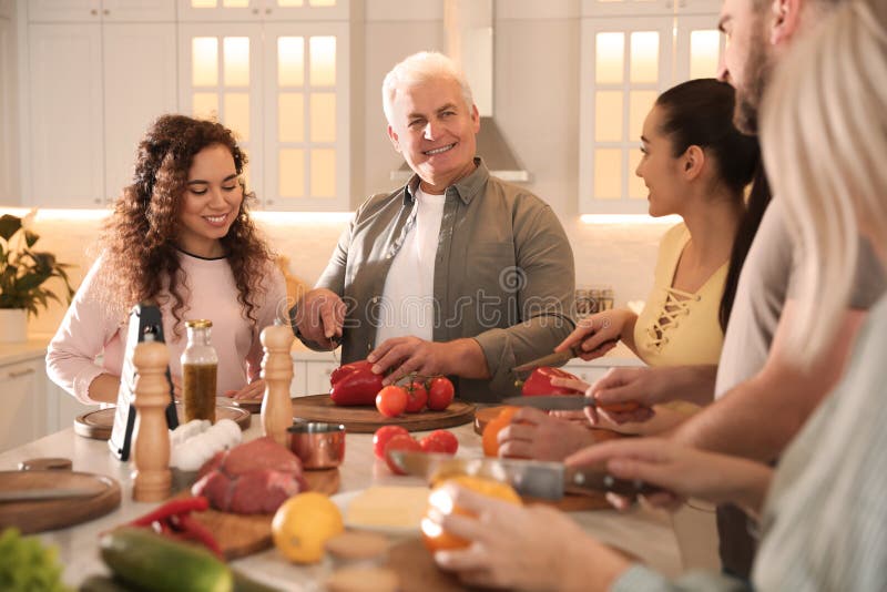 Happy People Cooking Food in Kitchen Stock Photo - Image of alcohol ...