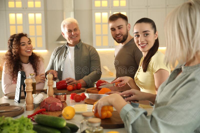 Happy People Cooking Food in Kitchen Stock Image - Image of indoors ...