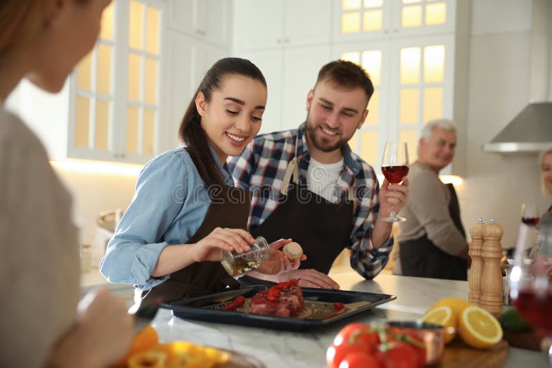 Happy People Cooking Food in Kitchen Stock Photo - Image of caucasian ...