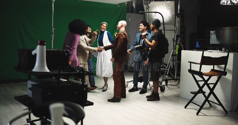 Happy People, Director or Cast with Handshake in Celebration for ...