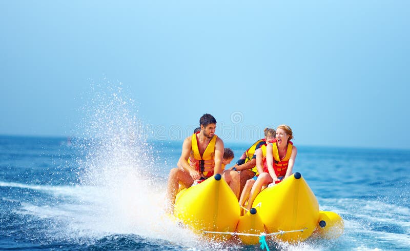 Happy People Having Fun on Banana Boat Stock Image - Image of game ...