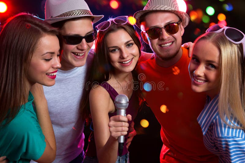 Happy People Having Fun Singing at a Party Stock Photo - Image of ...
