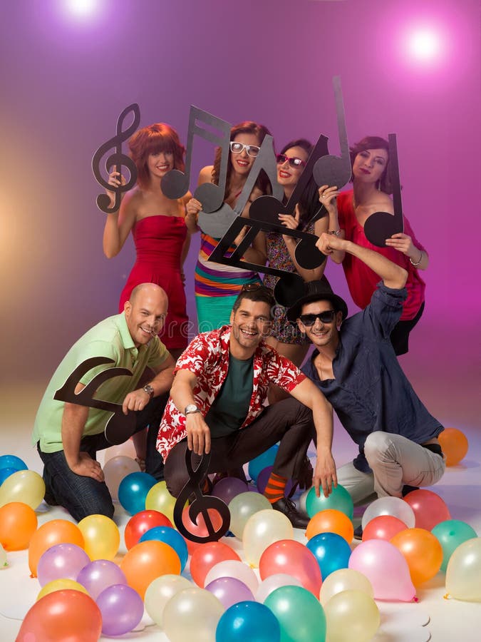 Happy People Holding Big Musical Notes Stock Photos - Free & Royalty ...