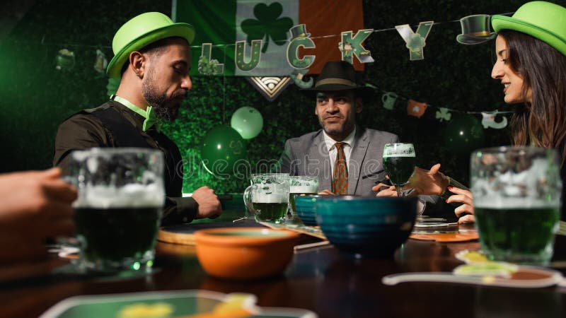 Happy People into a Pub Celebrate the Saint Patrick Day Stock Photo ...