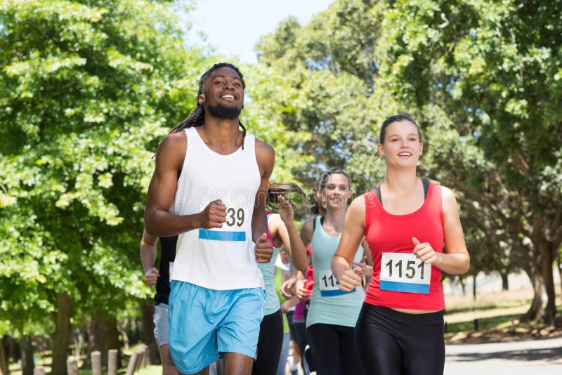 Happy People Running Race in Park Stock Image - Image of exercise ...