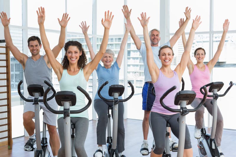 Happy People Working Out at Spinning Class Stock Photo - Image of young ...