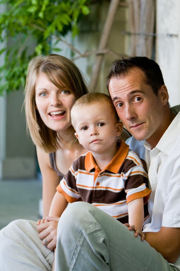 Happy perfect young family stock image. Image of house - 10830563
