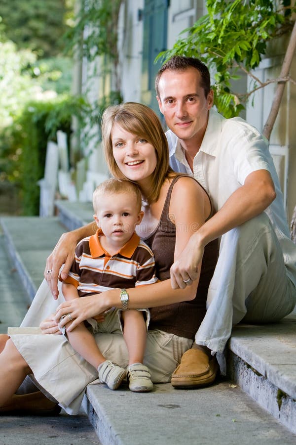 Happy perfect young family stock image. Image of house - 10830563