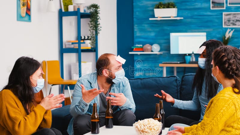 Happy Persons with Sticky Notes on Forehead Playing Name Game Stock ...