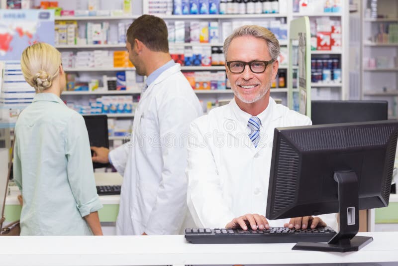 Happy Pharmacist Looking at Camera Stock Image - Image of indoors ...