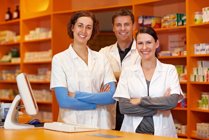 Pharmacy Team Holding Thumbs Up Stock Photo - Image of colleagues ...