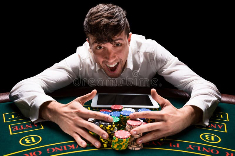 Happy player online poker stock image. Image of playing - 81469181