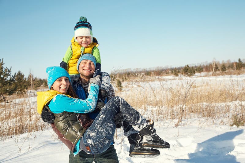 Happy Playing Family in the Winter. People Outdoors Stock Photo - Image ...