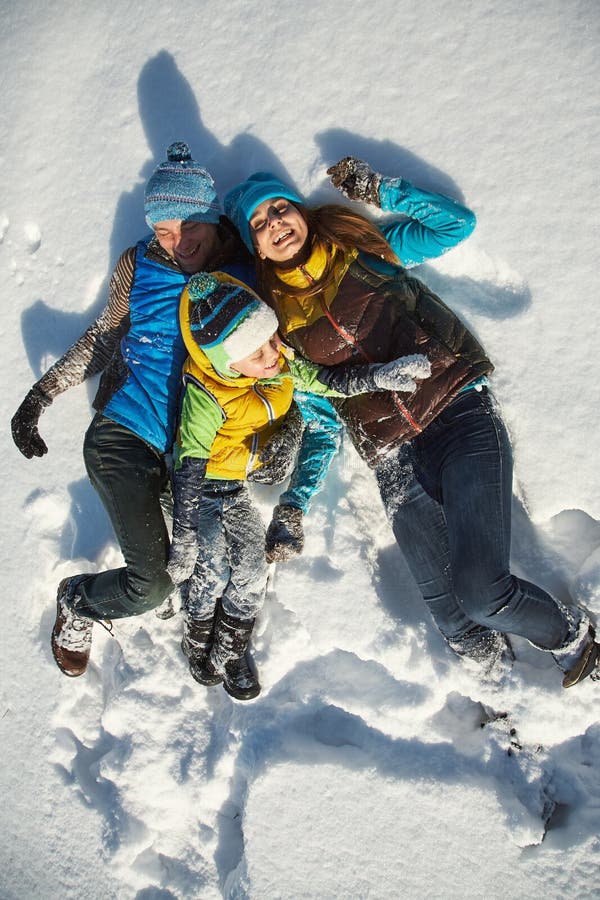 Happy Playing Family in the Winter. People Outdoors Stock Image - Image ...
