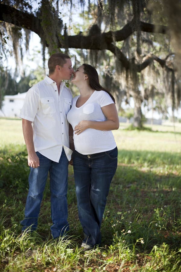 Young Pregnant couple stock photo. Image of expecting - 19387734