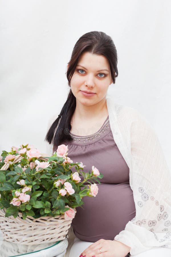 Happy pregnant woman stock photo. Image of flowers, feminine - 28747976