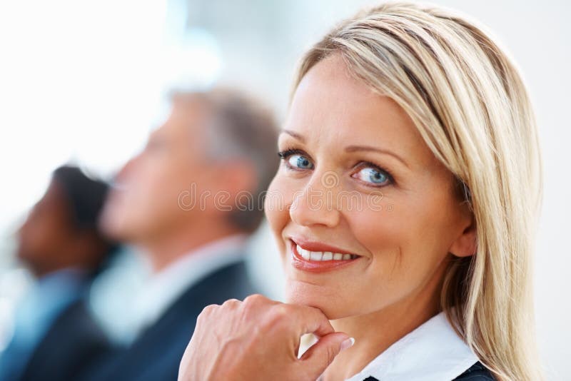 Happy Pretty Business Woman with Staff in the Back Stock Image - Image ...