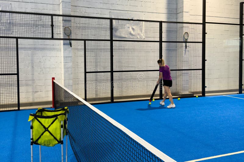 Happy Pretty Girl Practicing Paddle Sport on the Paddle Court Stock ...
