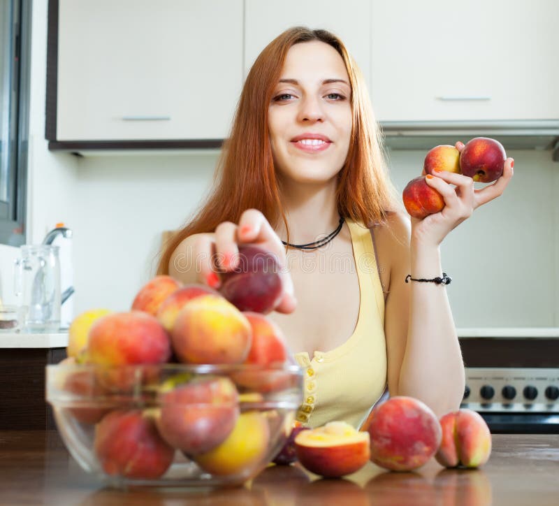 Happy Pretty Woman Holding Peaches Stock Photo - Image of hold, person ...