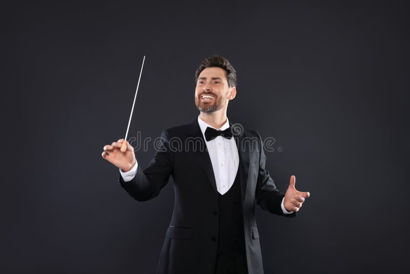 Professional Conductor with Baton on Black Background Stock Image ...