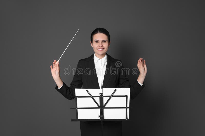 Happy Professional Conductor with Baton and Note Stand on Grey ...