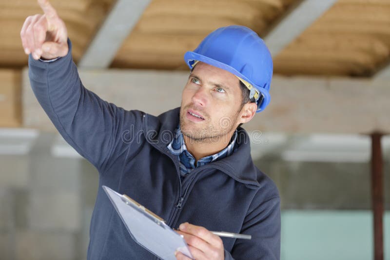 Happy Professional Engineer Pointing To Something Stock Image - Image ...