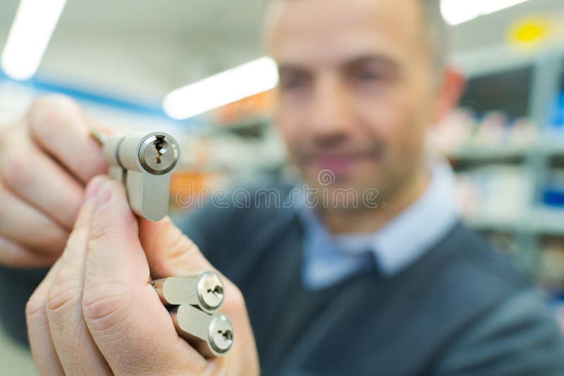 Happy Professional Key Maker Stock Photo - Image of practice, hand ...