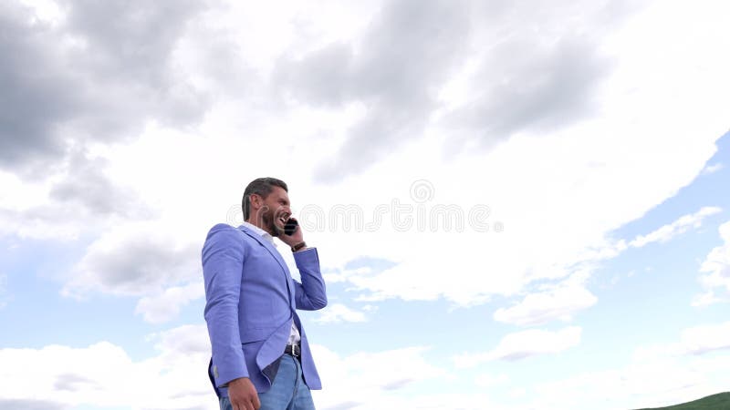 Happy Professional Man Make Winning Gesture after Mobile Phone Call on ...