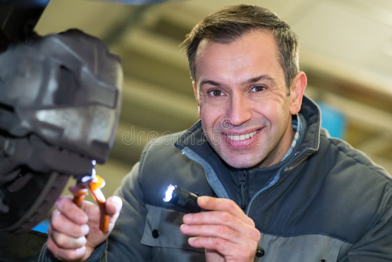 Happy Professional Workman at Workshop Stock Photo - Image of senior ...