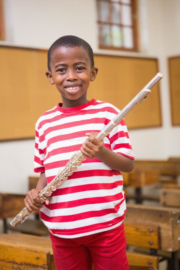 Happy pupil holding flute stock image. Image of cute - 51705797