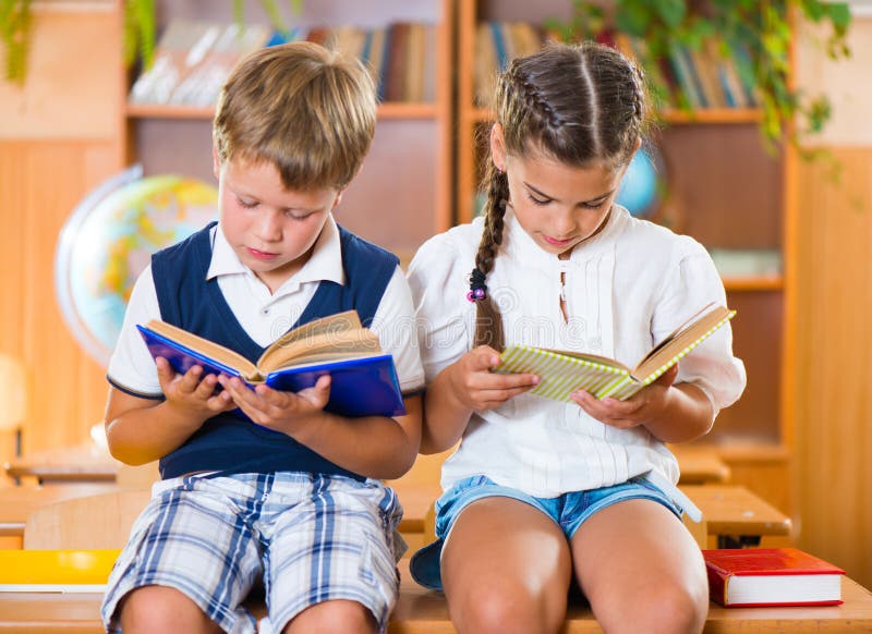 Happy pupils at school stock photo. Image of books, pretty - 37564866