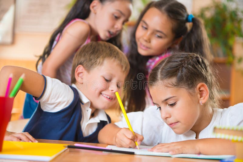 Happy pupils at school stock photo. Image of development - 37565108