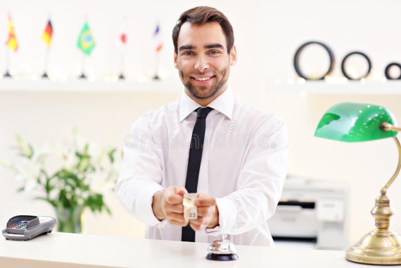 Happy Receptionist Working in Hotel Stock Photo - Image of caucasian ...