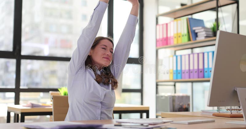 Happy Relaxing Woman Stretching in Front of Computer in Office Stock ...