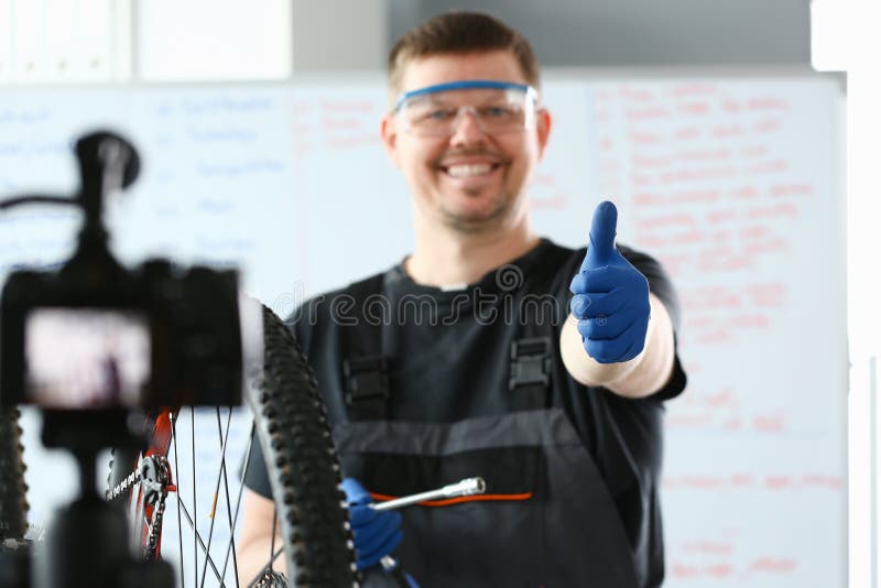 Happy Repairer Working on Modern Mountain Bicycle Stock Photo - Image ... Happy Repairer Working on Modern Mountain Bicycle Stock Photo - Image ...
