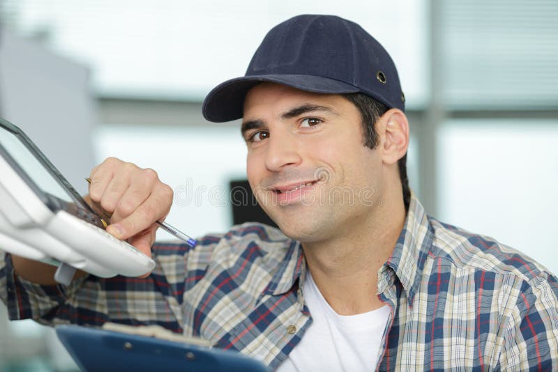 Happy Repairman Repairing Broken Printer Fax Machine Stock Photo ...