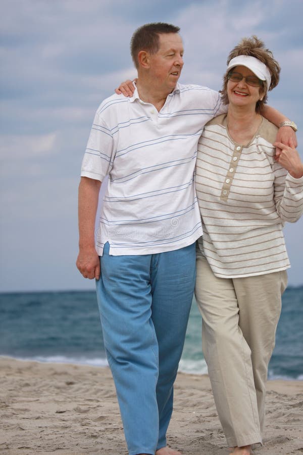 Happy Retired Hugging Couple Stock Photo - Image of holiday, baby: 8053196