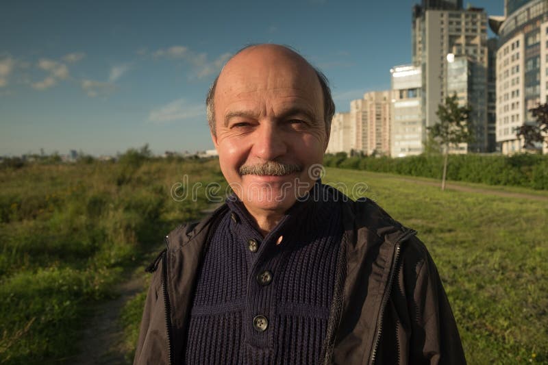 Happy Retired Man Standing in Warm Jacket and Looking at Camera. Stock ...