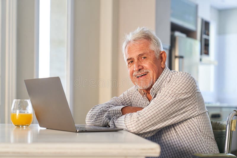 Happy Retired Senior Working on Laptop Computer at Home Stock Image ...