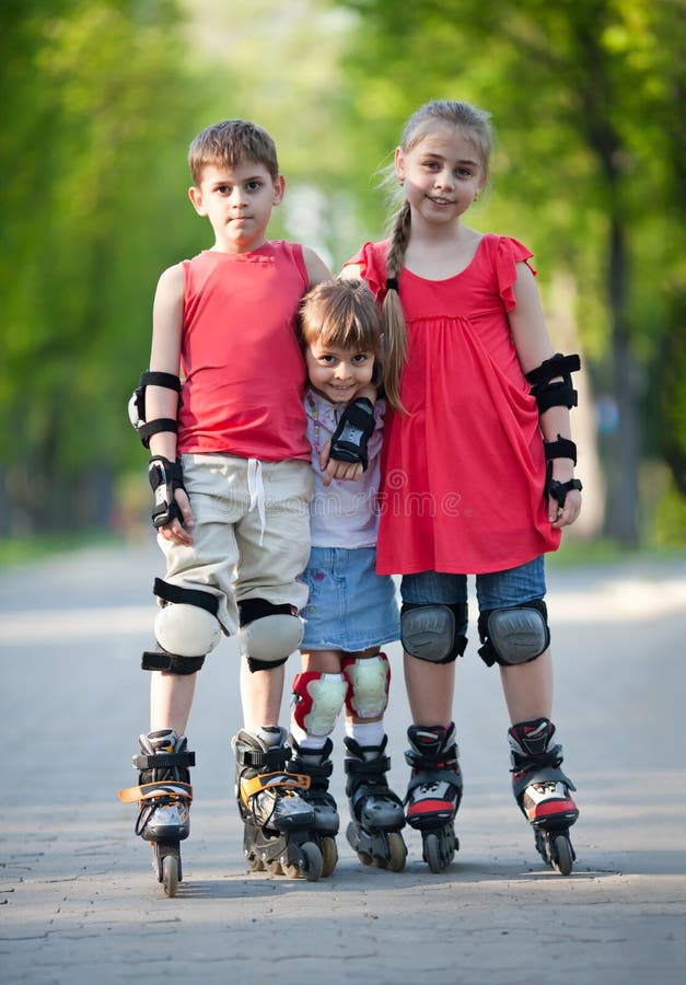 Happy rollerbladers stock image. Image of caucasian, friendship - 25039927
