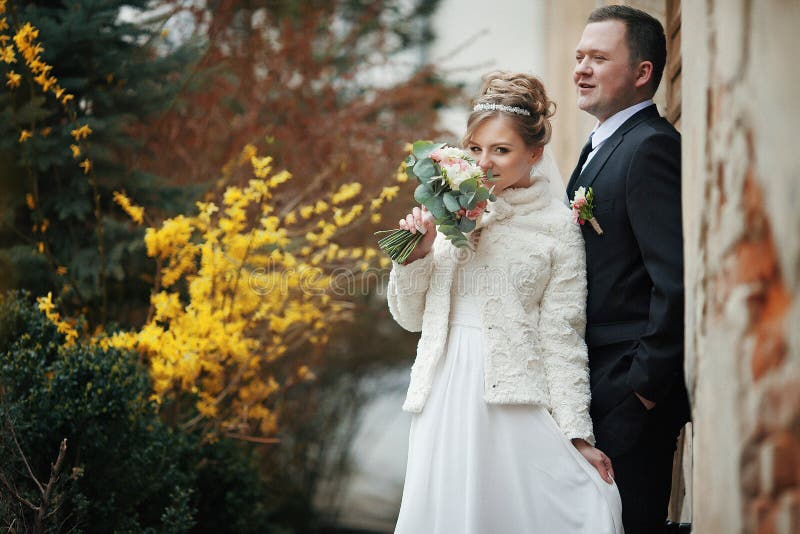 Happy Romantic Couple Posing Near Old Wall in Autumn Stock Photo ...