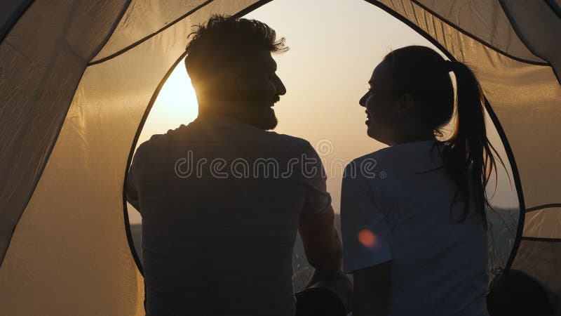 The Happy Romantic Couple Sitting at the Campsite Tent. Stock Image ...