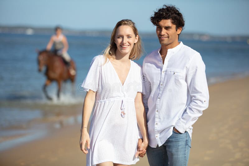 Happy Romantic Couple Spending Time Together on Beach Stock Photo ...
