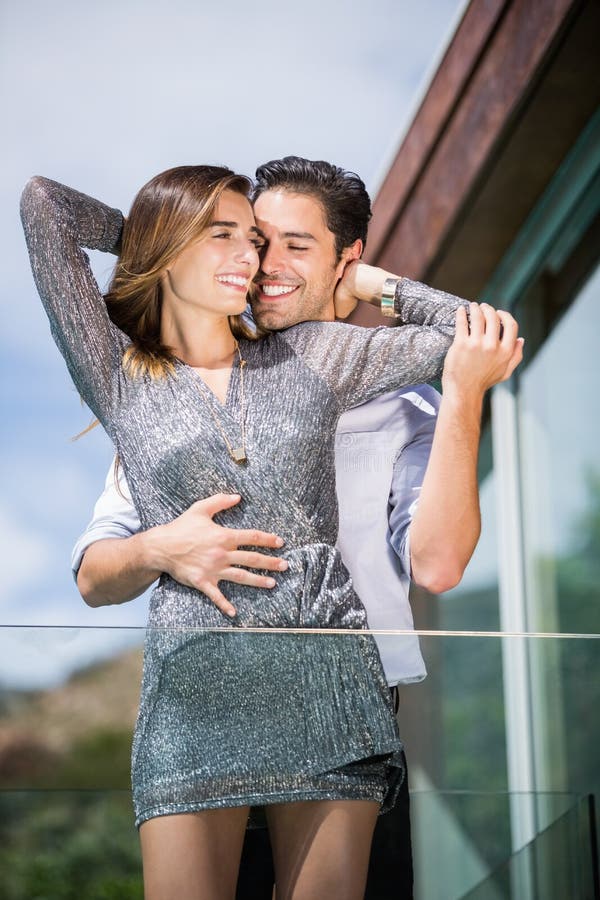 Happy Romantic Young Couple Embracing Stock Photo - Image of glamour ...