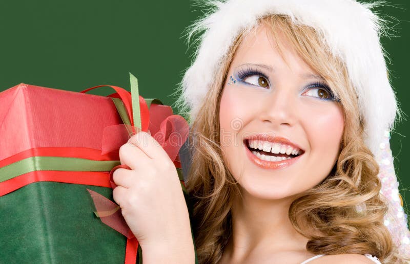 Happy Santa Helper with Gift Box Stock Photo - Image of looking ...