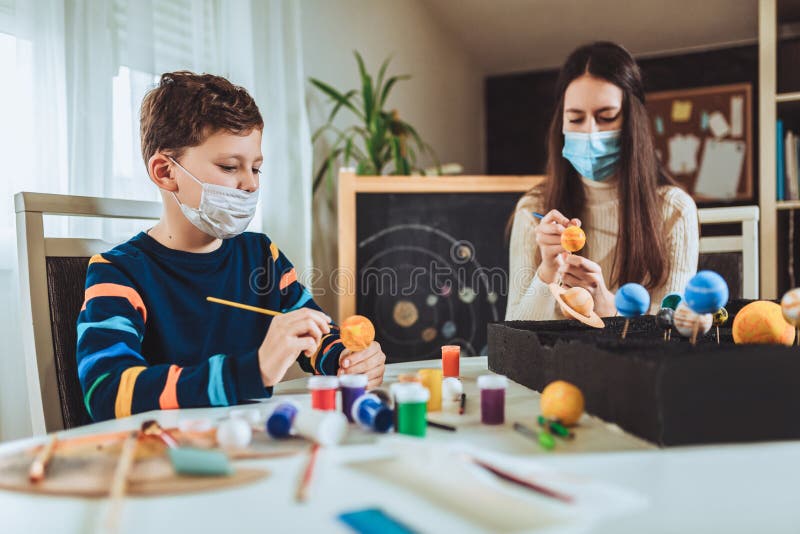 School Boy and Girl with Protective Mask Making a Solar System for a ...
