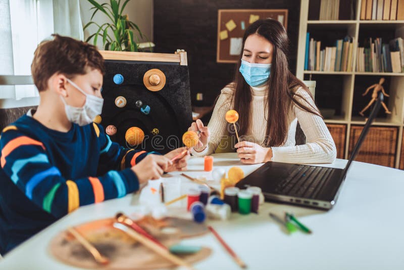 School Boy and Girl with Protective Mask Making a Solar System for a ...
