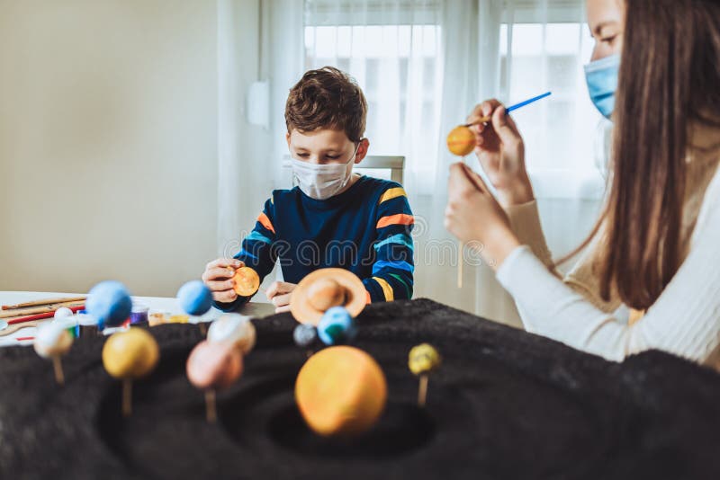 School Boy and Girl with Protective Mask Making a Solar System for a ...