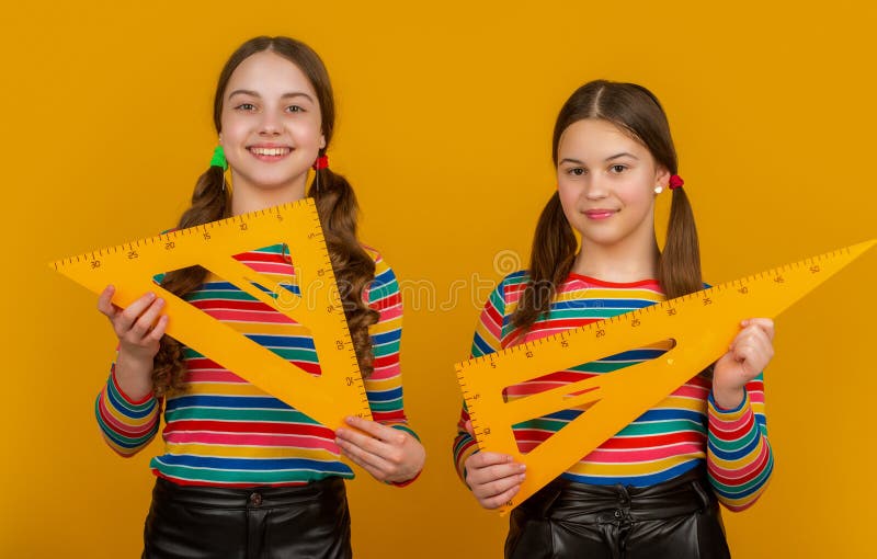 Happy School Children Hold Math Tool of Triangle Stock Photo - Image of ...