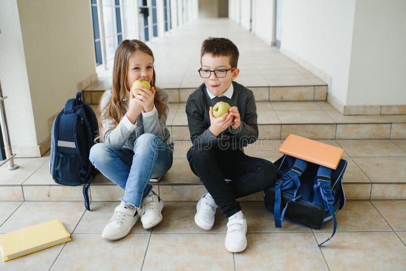 Happy School Kids in Corridor at School Stock Photo - Image of junior ...